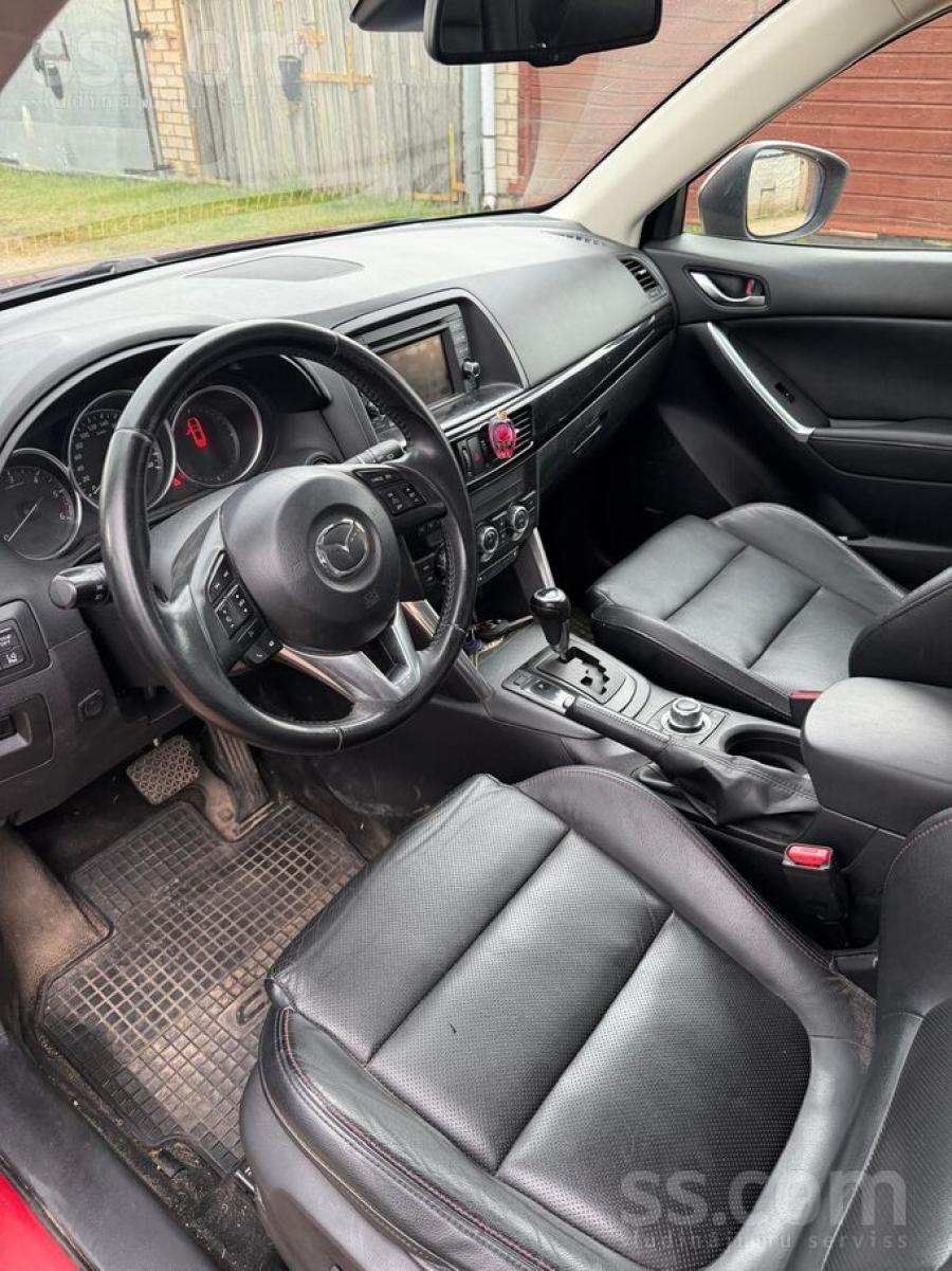 Red Mazda CX-5 2012 in Bauska, with an engine capacity of 2.20 L and mileage of 184 thousand km for 6500 €, photo 16 on AUTOMOTO.COM.LV