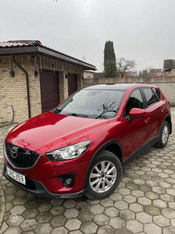 Sarkans Mazda CX-5 2013 Viļņa, ar dzinēja tilpumu 2.18 L un nobraukumu 191 tūkst. km par 7700 €, foto 1 vietnē AUTOMOTO.COM.LV