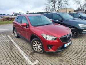 Sarkans Mazda CX-5 2013 Viļņa, ar dzinēja tilpumu 2.20 L un nobraukumu 243 tūkst. km par 2900 €, foto  vietnē AUTOMOTO.COM.LV
