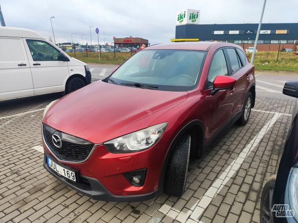 Red Mazda CX-5 2013 in Vilnius, with an engine capacity of 2.20 L and mileage of 243 thousand km for 2900 €, photo 2 on AUTOMOTO.COM.LV