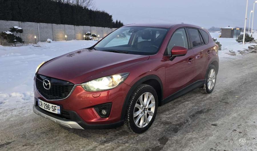 Sarkans Mazda CX-5 2013 Tauragė, ar dzinēja tilpumu 2.19 L un nobraukumu 176 tūkst. km par 6800 €, foto 3 vietnē AUTOMOTO.COM.LV
