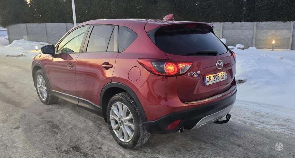 Red Mazda CX-5 2013 in Taurage, with an engine capacity of 2.19 L and mileage of 176 thousand km for 6800 €, photo 5 on AUTOMOTO.COM.LV