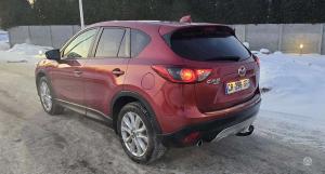 Sarkans Mazda CX-5 2013 Tauragė, ar dzinēja tilpumu 2.19 L un nobraukumu 176 tūkst. km par 6800 €, foto 5 vietnē AUTOMOTO.COM.LV