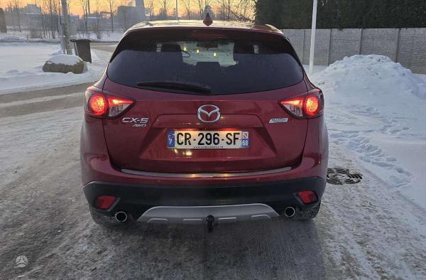 Red Mazda CX-5 2013 in Taurage, with an engine capacity of 2.19 L and mileage of 176 thousand km for 6800 €, photo 6 on AUTOMOTO.COM.LV