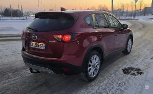 Sarkans Mazda CX-5 2013 Tauragė, ar dzinēja tilpumu 2.19 L un nobraukumu 176 tūkst. km par 6800 €, foto 7 vietnē AUTOMOTO.COM.LV
