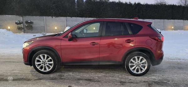 Red Mazda CX-5 2013 in Taurage, with an engine capacity of 2.19 L and mileage of 176 thousand km for 6800 €, photo 8 on AUTOMOTO.COM.LV