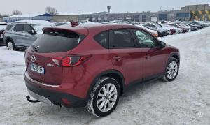 Red Mazda CX-5 2013 in Taurage, with an engine capacity of 2.19 L and mileage of 176 thousand km for 6750 €, photo 6 on AUTOMOTO.COM.LV
