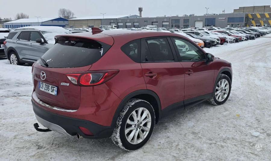 Red Mazda CX-5 2013 in Taurage, with an engine capacity of 2.19 L and mileage of 176 thousand km for 6750 €, photo 6 on AUTOMOTO.COM.LV