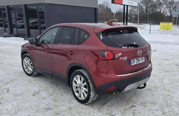 Sarkans Mazda CX-5 2013 Tauragė, ar dzinēja tilpumu 2.19 L un nobraukumu 176 tūkst. km par 6750 €, foto 8 vietnē AUTOMOTO.COM.LV