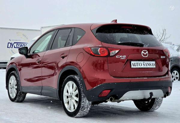 Red Mazda CX-5 2013 in Taurage, with an engine capacity of 2.20 L and mileage of 175 thousand km for 6950 €, photo 7 on AUTOMOTO.COM.LV