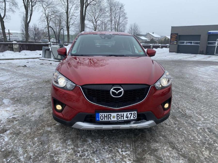 Red Mazda CX-5 2013 in Taurage, with an engine capacity of 2.19 L and mileage of 189 thousand km for 6800 €, photo 2 on AUTOMOTO.COM.LV