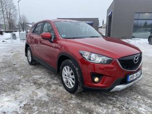 Red Mazda CX-5 2013 in Taurage, with an engine capacity of 2.19 L and mileage of 189 thousand km for 6800 €, photo 3 on AUTOMOTO.COM.LV