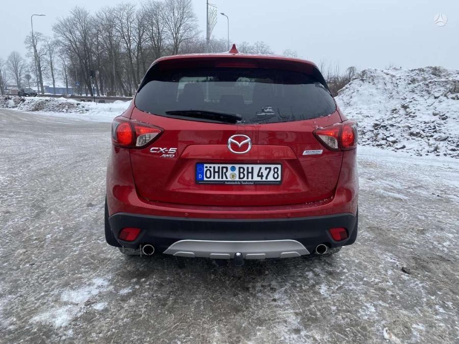 Red Mazda CX-5 2013 in Taurage, with an engine capacity of 2.19 L and mileage of 189 thousand km for 6800 €, photo 5 on AUTOMOTO.COM.LV