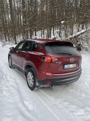 Red Mazda CX-5 2013 in Vievis, with an engine capacity of 2.20 L and mileage of 243 thousand km for 7300 €, photo 2 on AUTOMOTO.COM.LV