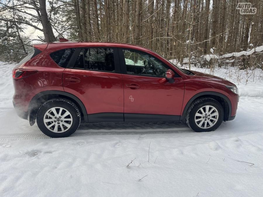 Red Mazda CX-5 2013 in Vievis, with an engine capacity of 2.20 L and mileage of 243 thousand km for 7300 €, photo 4 on AUTOMOTO.COM.LV