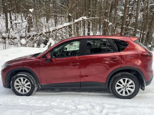 Red Mazda CX-5 2013 in Vievis, with an engine capacity of 2.20 L and mileage of 243 thousand km for 7300 €, photo 5 on AUTOMOTO.COM.LV