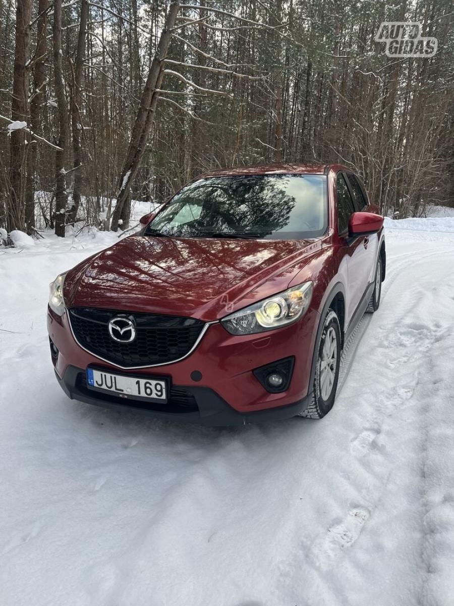 Red Mazda CX-5 2013 in Vievis, with an engine capacity of 2.20 L and mileage of 243 thousand km for 7300 €, photo 6 on AUTOMOTO.COM.LV