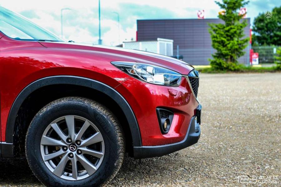 Red Mazda CX-5 2013 in Kretinga, with an engine capacity of 2.20 L and mileage of 218 thousand km for 7750 €, photo 8 on AUTOMOTO.COM.LV