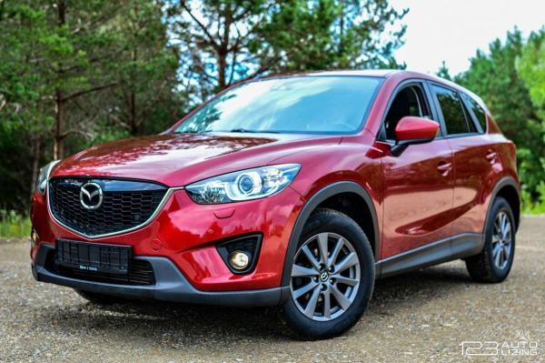 Red Mazda CX-5 2013 in Kretinga, with an engine capacity of 2.20 L and mileage of 218 thousand km for 7750 €, photo 1 on AUTOMOTO.COM.LV