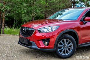 Red Mazda CX-5 2013 in Kretinga, with an engine capacity of 2.20 L and mileage of 218 thousand km for 7750 €, photo 3 on AUTOMOTO.COM.LV