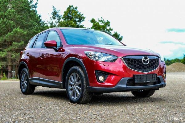 Red Mazda CX-5 2013 in Kretinga, with an engine capacity of 2.20 L and mileage of 218 thousand km for 7750 €, photo 6 on AUTOMOTO.COM.LV