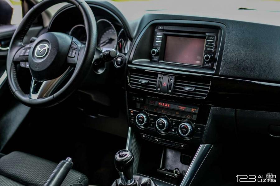 Red Mazda CX-5 2013 in Kretinga, with an engine capacity of 2.20 L and mileage of 218 thousand km for 7750 €, photo 27 on AUTOMOTO.COM.LV