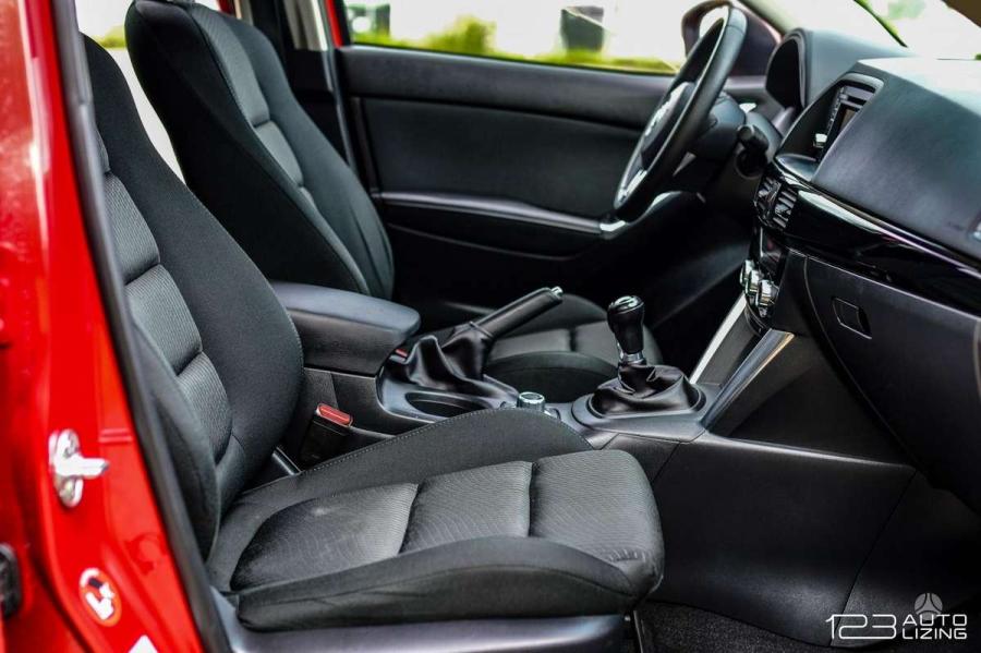 Red Mazda CX-5 2013 in Kretinga, with an engine capacity of 2.20 L and mileage of 218 thousand km for 7750 €, photo 28 on AUTOMOTO.COM.LV