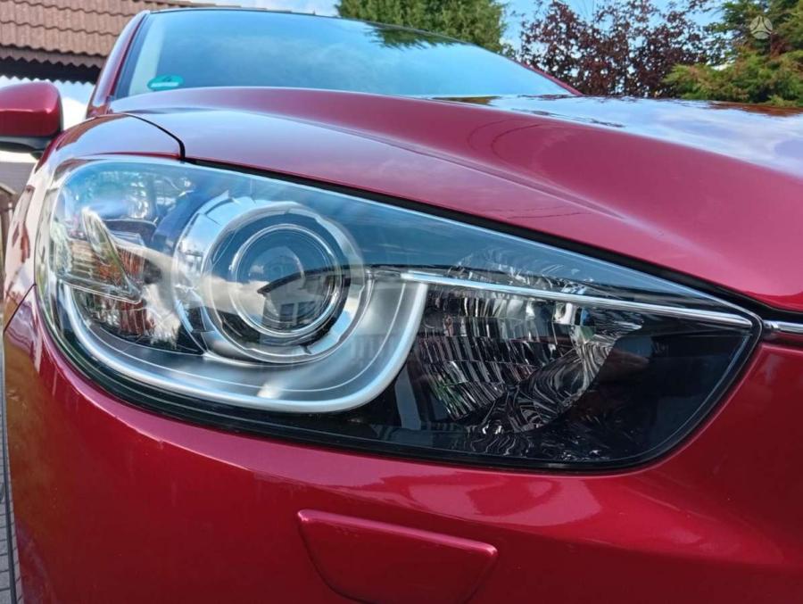 Sarkans Mazda CX-5 2013 Šauļi, ar dzinēja tilpumu 2.20 L un nobraukumu 199 tūkst. km par 9400 €, foto 24 vietnē AUTOMOTO.COM.LV
