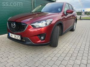 Sarkans Mazda CX-5 2013 Rīga, ar dzinēja tilpumu 2.20 L un nobraukumu 162 tūkst. km par 5500 €, foto  vietnē AUTOMOTO.COM.LV