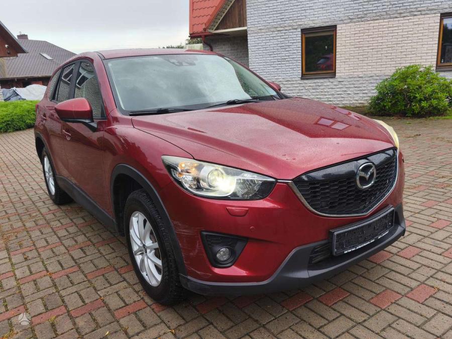 Red Mazda CX-5 2013 in Prienai, with an engine capacity of 2.19 L and mileage of 220 thousand km for 2400 €, photo 3 on AUTOMOTO.COM.LV