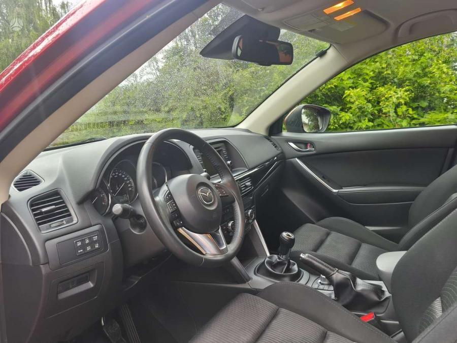 Red Mazda CX-5 2013 in Prienai, with an engine capacity of 2.19 L and mileage of 220 thousand km for 2400 €, photo 7 on AUTOMOTO.COM.LV
