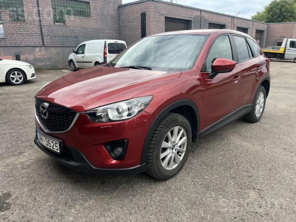 Red Mazda CX-5 2013 in Riga, with an engine capacity of 2.20 L and mileage of 163 thousand km for 4900 €, photo 2 on AUTOMOTO.COM.LV