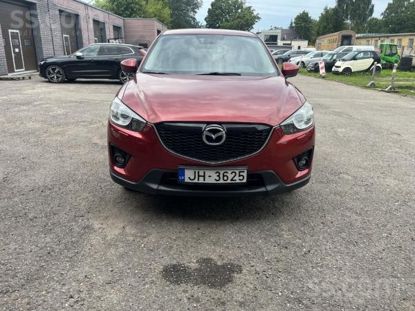 Red Mazda CX-5 2013 in Riga, with an engine capacity of 2.20 L and mileage of 163 thousand km for 4900 €, photo 4 on AUTOMOTO.COM.LV