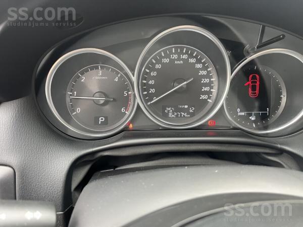 Red Mazda CX-5 2013 in Riga, with an engine capacity of 2.20 L and mileage of 163 thousand km for 4900 €, photo 5 on AUTOMOTO.COM.LV