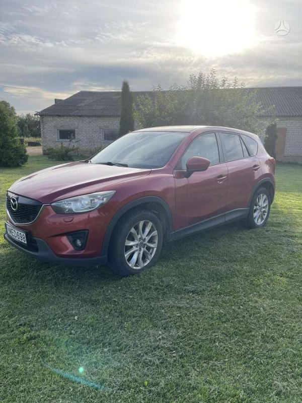 Red Mazda CX-5 2013 in Kaunas, with an engine capacity of 2.19 L and mileage of 327 thousand km for 4500 €, photo 4 on AUTOMOTO.COM.LV