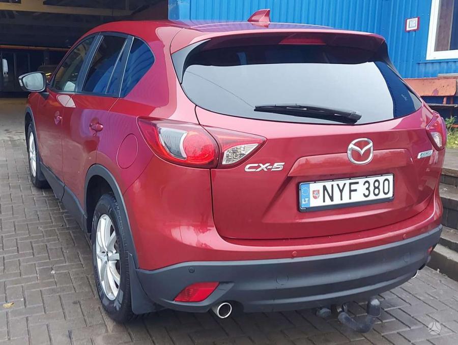 Red Mazda CX-5 2013 in Telschi, with an engine capacity of 2.20 L and mileage of 262 thousand km for 6300 €, photo 5 on AUTOMOTO.COM.LV