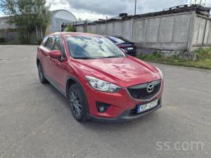 Sarkans Mazda CX-5 2013 Rīga, ar dzinēja tilpumu 2.20 L un nobraukumu 244 tūkst. km par 2990 €, foto  vietnē AUTOMOTO.COM.LV