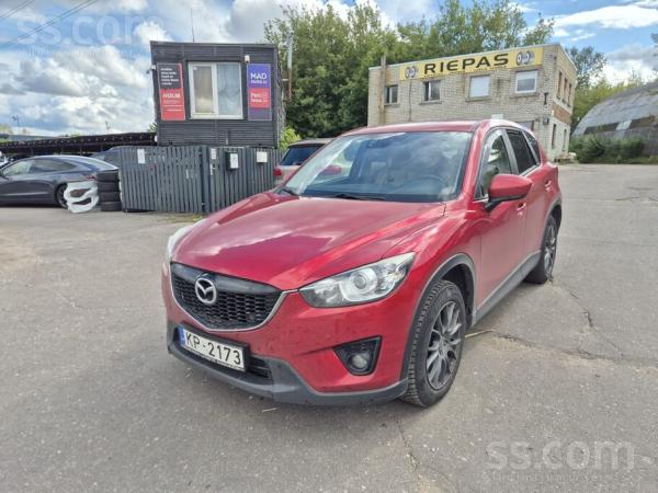 Sarkans Mazda CX-5 2013 Rīga, ar dzinēja tilpumu 2.20 L un nobraukumu 244 tūkst. km par 2990 €, foto 4 vietnē AUTOMOTO.COM.LV