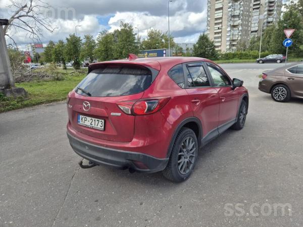 Sarkans Mazda CX-5 2013 Rīga, ar dzinēja tilpumu 2.20 L un nobraukumu 244 tūkst. km par 2990 €, foto 6 vietnē AUTOMOTO.COM.LV