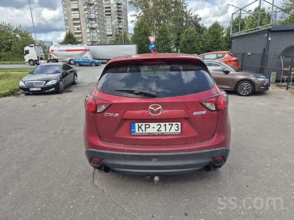 Sarkans Mazda CX-5 2013 Rīga, ar dzinēja tilpumu 2.20 L un nobraukumu 244 tūkst. km par 2990 €, foto 7 vietnē AUTOMOTO.COM.LV