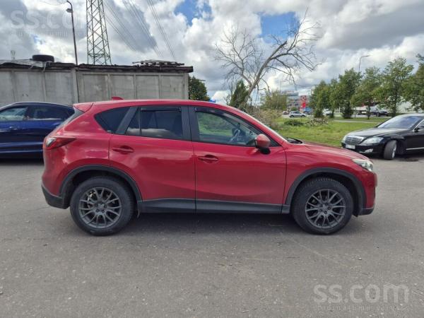 Sarkans Mazda CX-5 2013 Rīga, ar dzinēja tilpumu 2.20 L un nobraukumu 244 tūkst. km par 2990 €, foto 9 vietnē AUTOMOTO.COM.LV