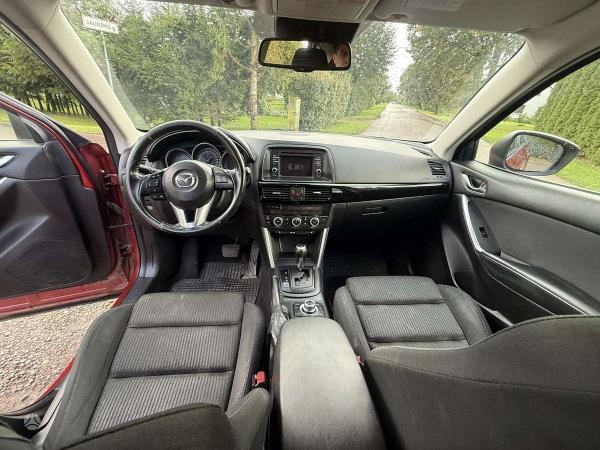 Mazda CX-5 2013 in Ukmerge on AUTOMOTO.COM.LV Red Mazda CX-5 2013 in Ukmerge, with an engine capacity of 2.19 L and mileage of 278 thousand km for 5500 €, photo 9 on AUTOMOTO.COM.LV