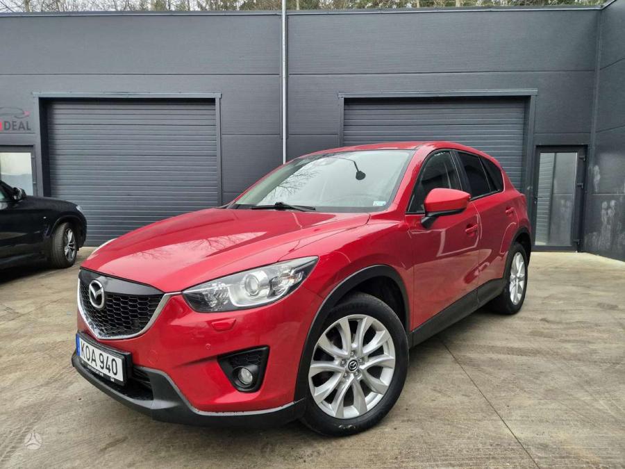 Red Mazda CX-5 2014 in Utena, with an engine capacity of 2.19 L and mileage of 261 thousand km for 6490 €, photo 1 on AUTOMOTO.COM.LV