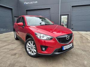 Red Mazda CX-5 2014 in Utena, with an engine capacity of 2.19 L and mileage of 261 thousand km for 6490 €, photo 2 on AUTOMOTO.COM.LV