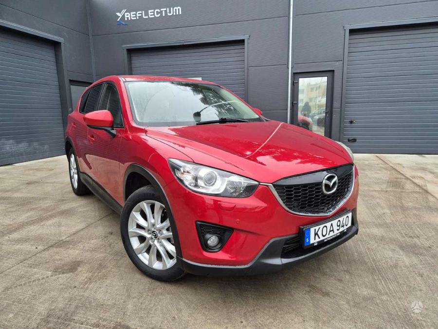 Red Mazda CX-5 2014 in Utena, with an engine capacity of 2.19 L and mileage of 261 thousand km for 6490 €, photo 2 on AUTOMOTO.COM.LV