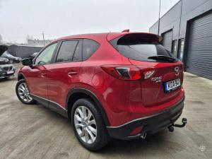 Red Mazda CX-5 2014 in Utena, with an engine capacity of 2.19 L and mileage of 261 thousand km for 6490 €, photo 4 on AUTOMOTO.COM.LV