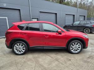Red Mazda CX-5 2014 in Utena, with an engine capacity of 2.19 L and mileage of 261 thousand km for 6490 €, photo 6 on AUTOMOTO.COM.LV