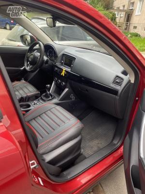 Red Mazda CX-5 2014 in Klaipeda, with an engine capacity of 2.20 L and mileage of 279 thousand km for 6400 €, photo 11 on AUTOMOTO.COM.LV