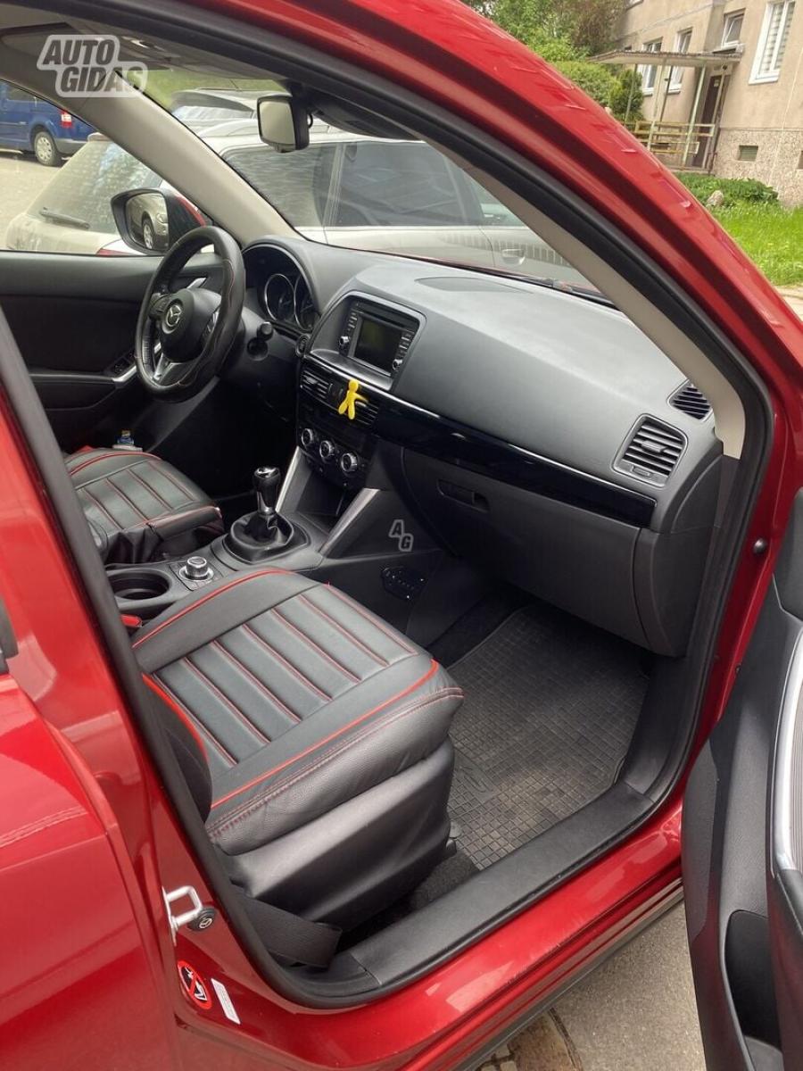 Red Mazda CX-5 2014 in Klaipeda, with an engine capacity of 2.20 L and mileage of 279 thousand km for 6400 €, photo 11 on AUTOMOTO.COM.LV