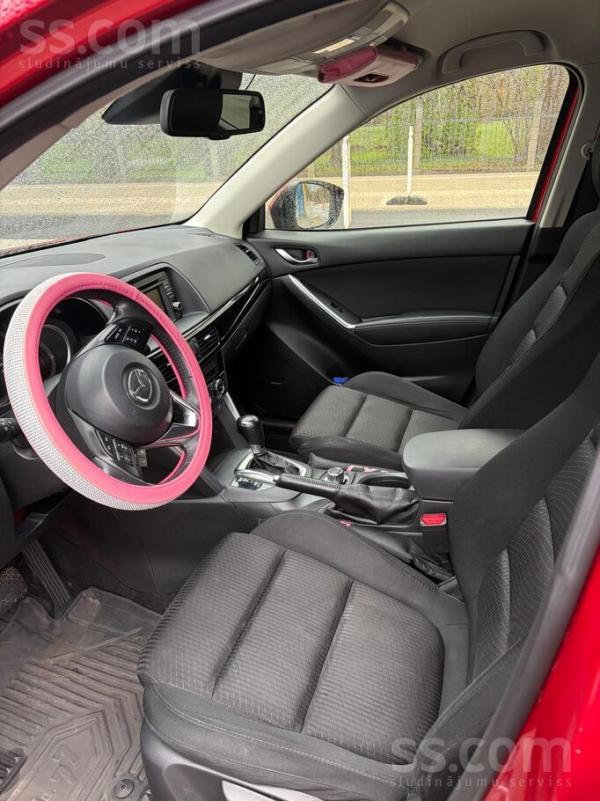 Red Mazda CX-5 2014 in Riga, with an engine capacity of 2.20 L and mileage of 234 thousand km for 6000 €, photo 6 on AUTOMOTO.COM.LV